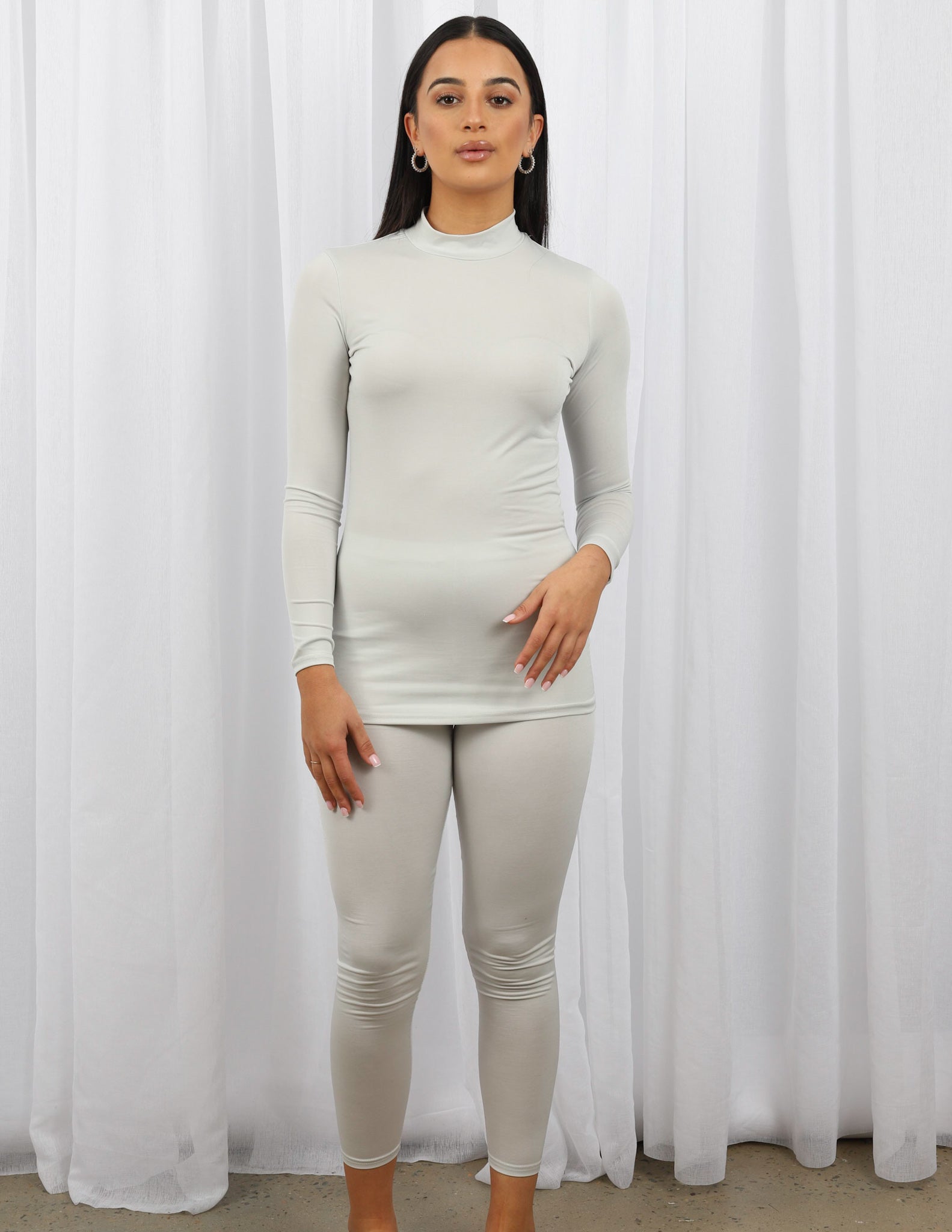 Women Tops - Luxe Lycra High Neck Body Top | Modelle